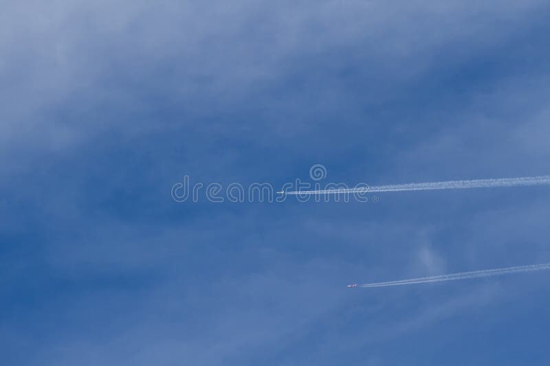 Two Planes Leaving Wake in the Blue Sky Stock Photo - Image of blue ...