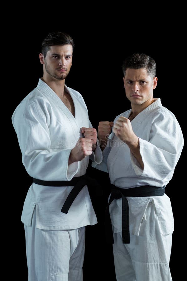 Two Karate Fighters Performing Karate Stance Stock Image - Image of ...