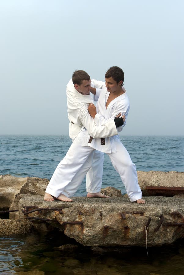 Two karateka fight stock photo. Image of blond, competition - 20371440