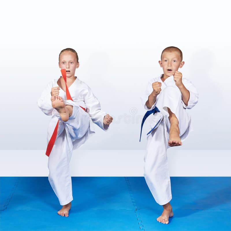 Two Karateka in Karategi are Beating Kick Leg Forward Stock Image ...
