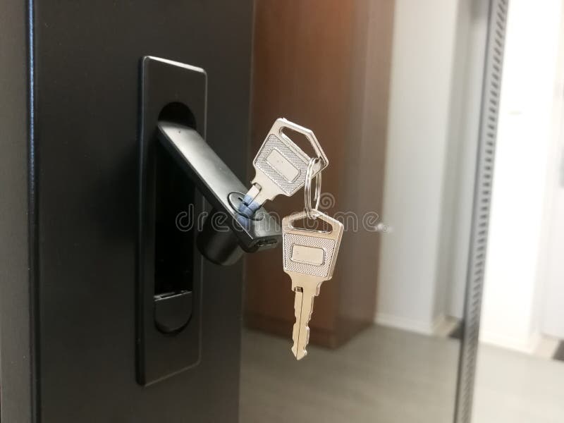 Two Keys in the Modern Lock Stock Photo - Image of access, metal: 200348666