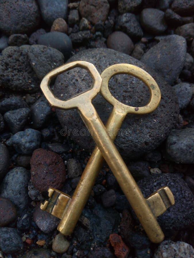 Two keys on the rock stock photo. Image of rock, locked - 247804702