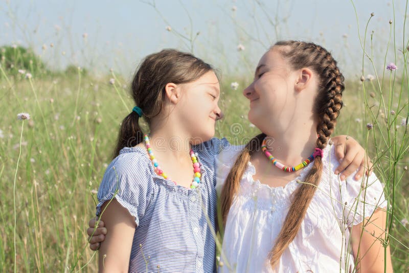 Two Kid Girls Having Fun on the Field Stock Image - Image of friendly ...