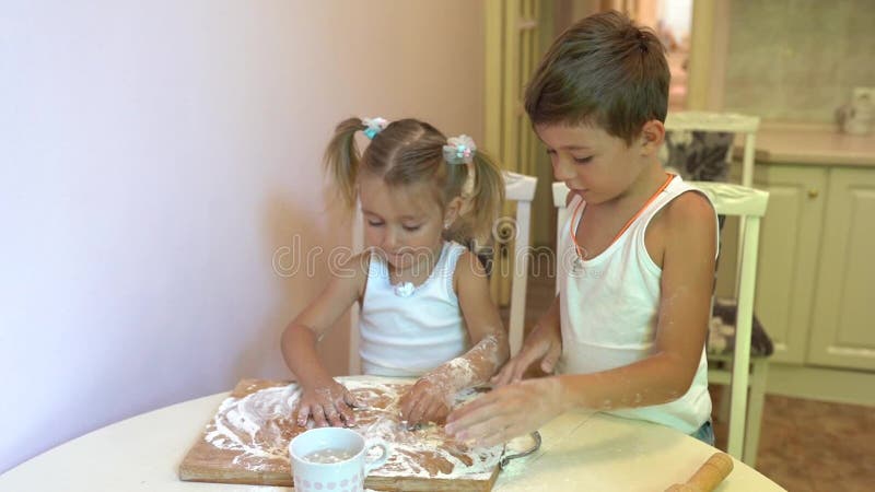 Two Kids Cooking in a Domestic Kitchen Stock Footage - Video of ...