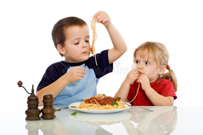 Two Kids Eating Pasta with Their Hands Stock Photo - Image of smile ...