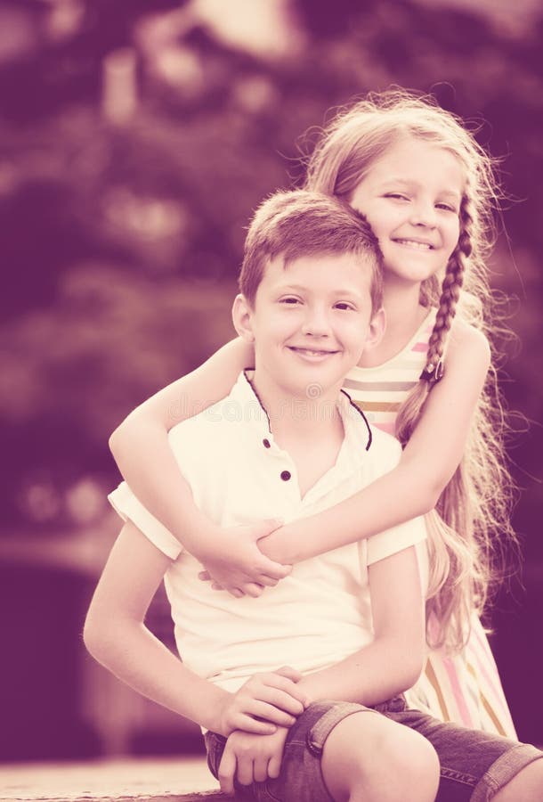 Two kids hugs stock image. Image of holding, hugs, embracing - 91038637