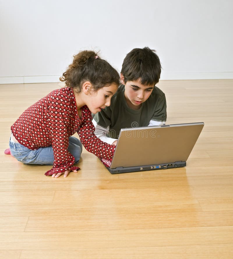 Kids with laptop stock image. Image of home, pensive, education - 4470037