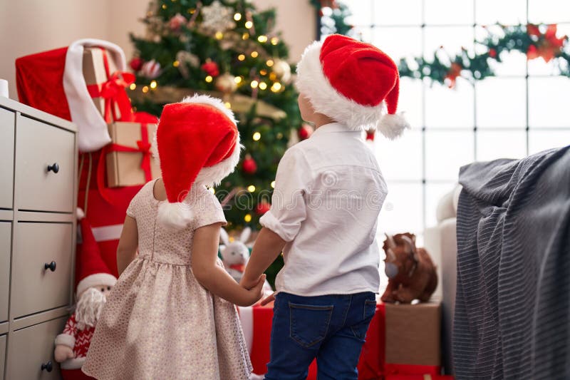 Two Kids Looking Christmas Tree at Home Stock Image - Image of presents ...