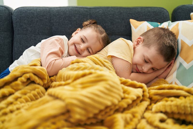 Two Kids Lying on Sofa Sleeping at Home Stock Photo - Image of child ...