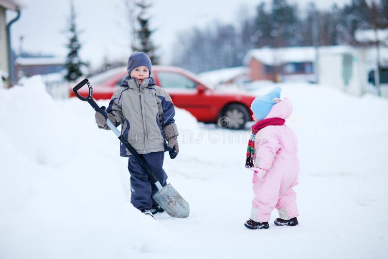 Two Kids Outdoors at Snowy Winter Day Stock Photo - Image of people ...
