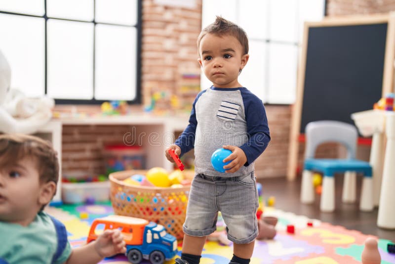 Two Kids Playing with Ball Standing at Kindergarten Stock Image - Image ...