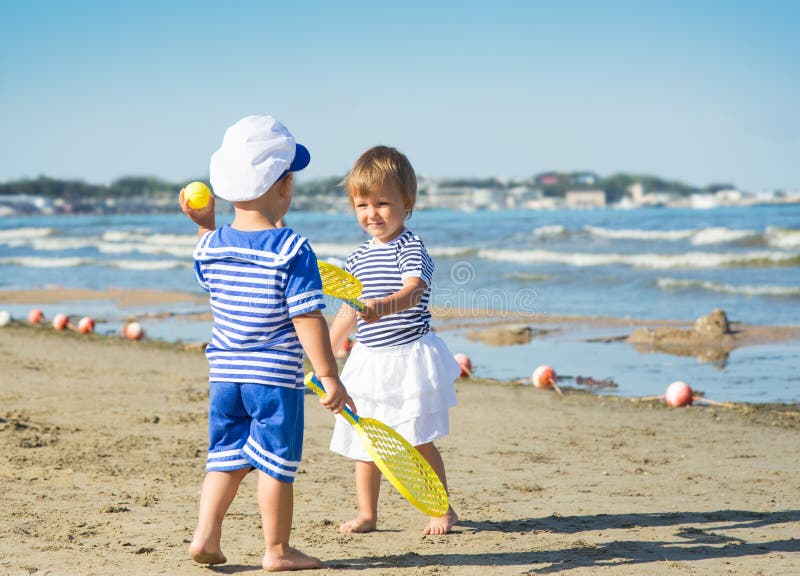 Two kids playing stock image. Image of happy, summer - 76355179