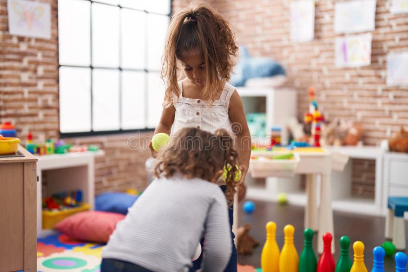 Two Kids Playing Bowling at Kindergarten Stock Photo - Image of serious ...