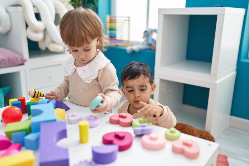 Two Kids Playing with Construction Blocks Standing at Kindergarten ...