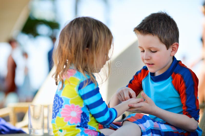 Two kids playing together stock image. Image of beautiful - 24009685