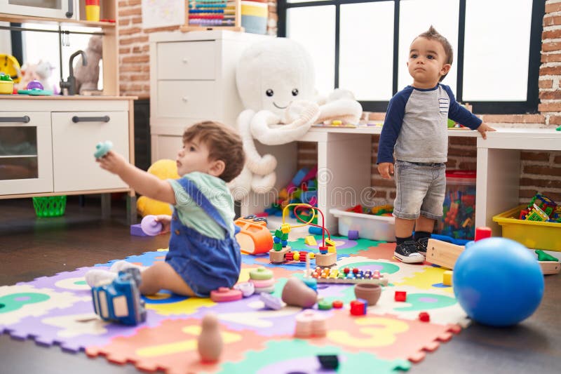 Two Kids Playing with Toys at Kindergarten Stock Photo - Image of ...