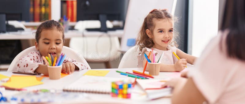 Two Kids Preschool Students Having Lesson with Teacher at Classroom ...
