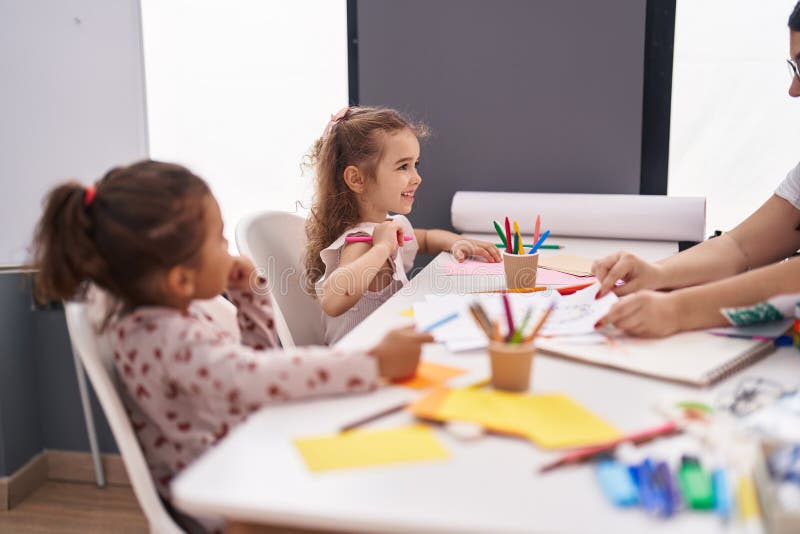 Two Kids Preschool Students Sitting on Table Drawing on Paper at ...