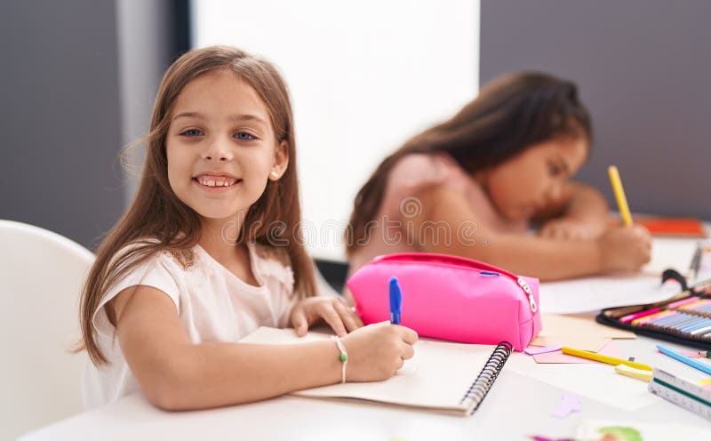 Two Kids Preschool Students Sitting on Table Drawing on Paper at ...
