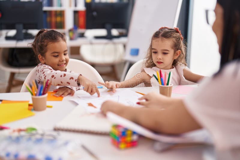 Two Kids Preschool Students Sitting on Table Drawing on Paper at ...