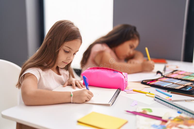 Two Kids Preschool Students Sitting on Table Drawing on Paper at ...