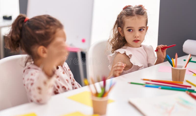 Two Kids Preschool Students Sitting on Table Drawing on Paper at ...