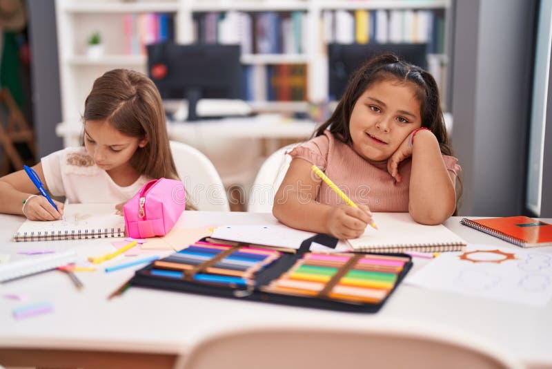 Two Kids Preschool Students Sitting on Table Drawing on Paper at ...
