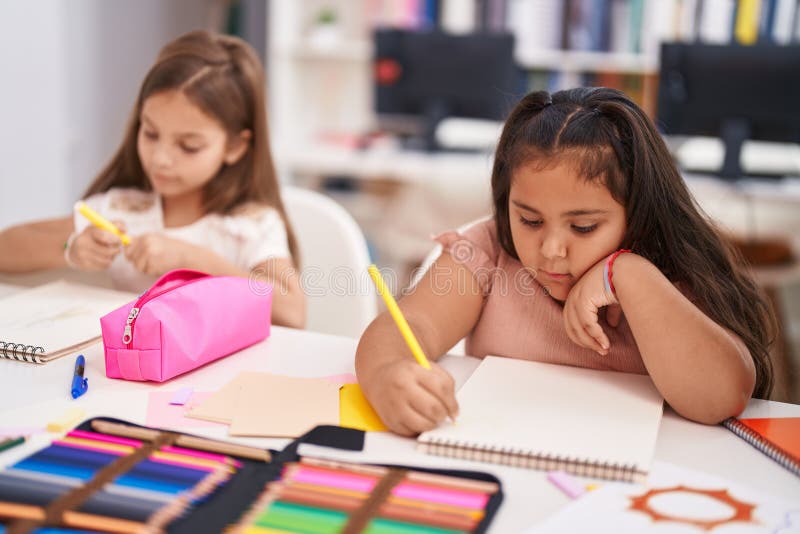 Two Kids Preschool Students Sitting on Table Drawing on Paper at ...