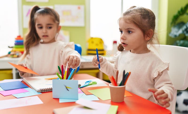 Two Kids Preschool Students Sitting on Table Drawing on Paper at ...