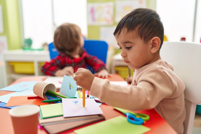 Two Kids Preschool Students Sitting on Table Drawing on Paper at ...