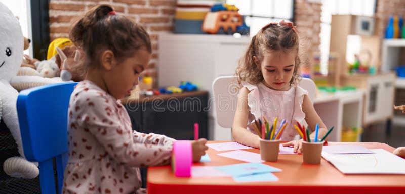 Two Kids Preschool Students Sitting on Table Drawing on Paper at ...