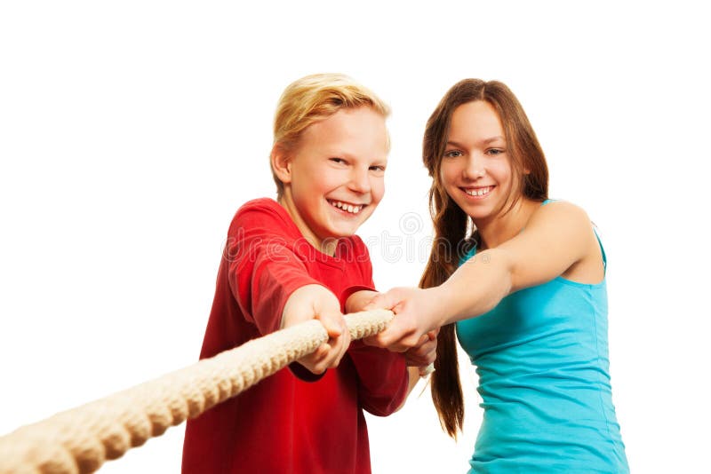 Two kids pulling the rope stock photo. Image of friend - 28403662