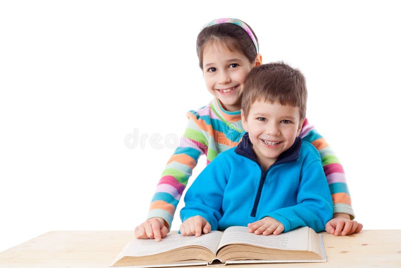 Two kids reading the book stock photo. Image of caucasian - 26437282