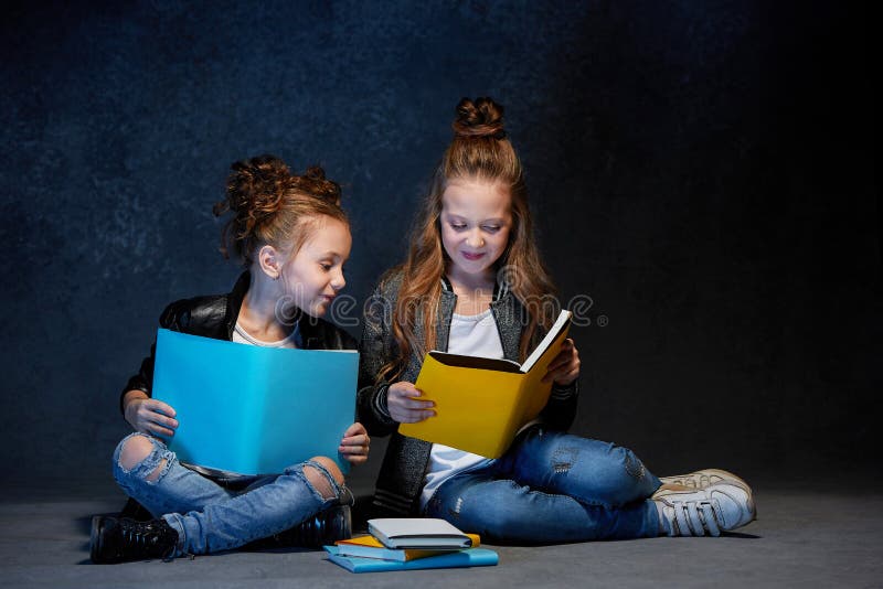 Two Kids Reading the Books at Studio Stock Photo - Image of child, page ...