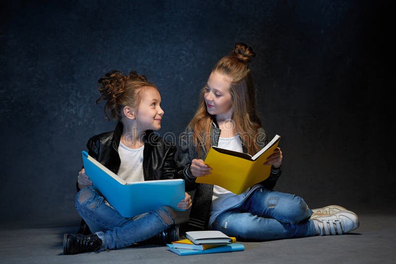 Two Kids Reading the Books at Studio Stock Image - Image of page ...