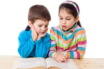 Two Kids Reading the Book at the Table Stock Photo - Image of learning ...