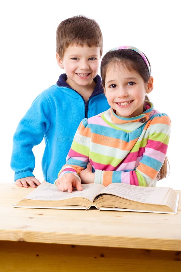 Kids reading book together stock photo. Image of brother - 3225986