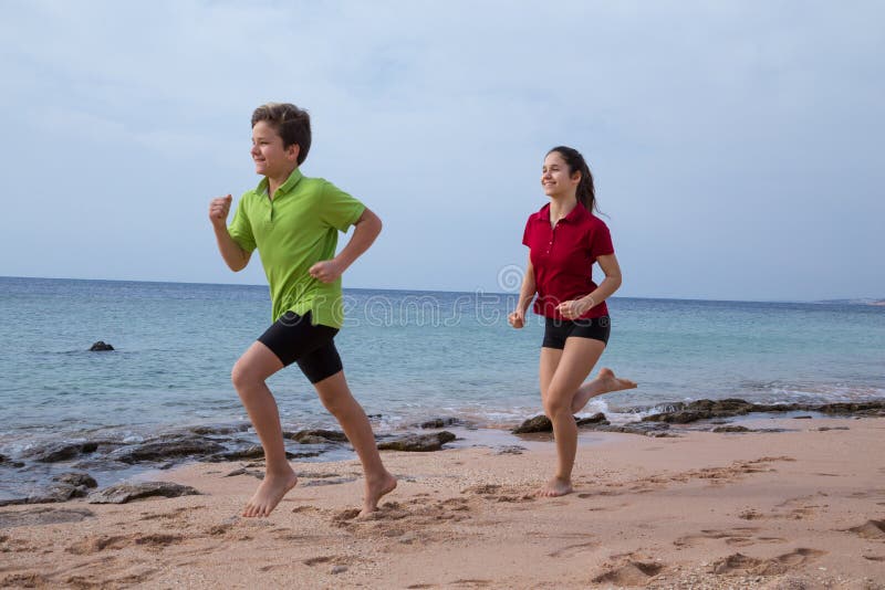 Two Kids Running Together at Morning Exersises Stock Image - Image of ...