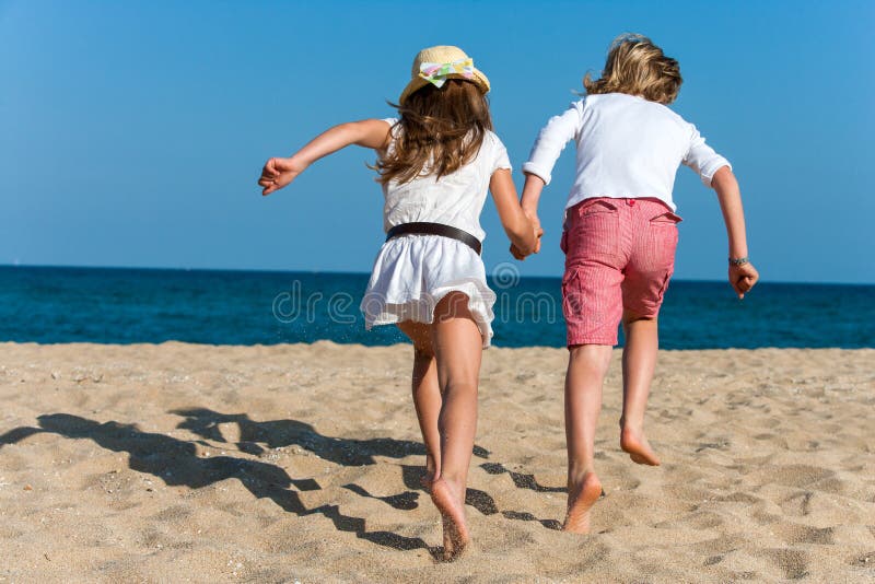 Two Kids Running Together Outdoors. Stock Photo - Image of expression ...
