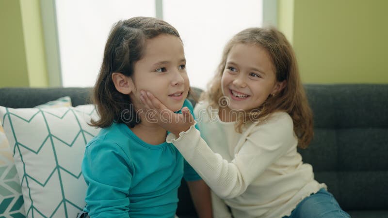 Two Kids Smiling Confident Sitting on Sofa Speaking at Home Stock Image ...