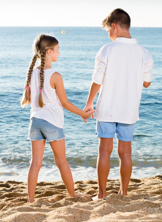 Two kids standing back stock photo. Image of friends - 86788644