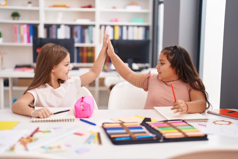 Two Kids Students Drawing on Paper High Five with Hands Raised Up at ...