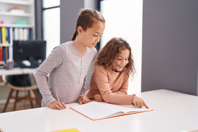 Two Kids Students Reading Book Studying at Classroom Stock Image ...