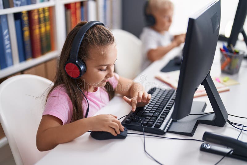 Two Kids Students Using Computer Studying at Classroom Stock Photo ...