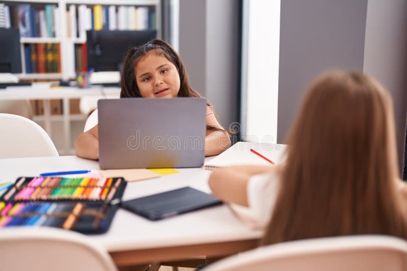 Two Kids Students Using Laptop Studying at Classroom Stock Image ... Two Kids Students Using Laptop Studying at Classroom Stock Image ...