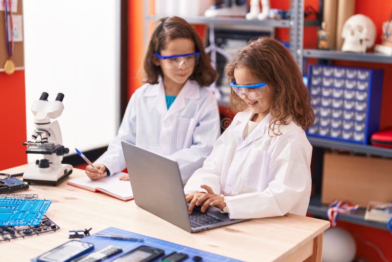 Two Kids Students Pouring Liquid on Test Tube at Laboratory Classroom ...