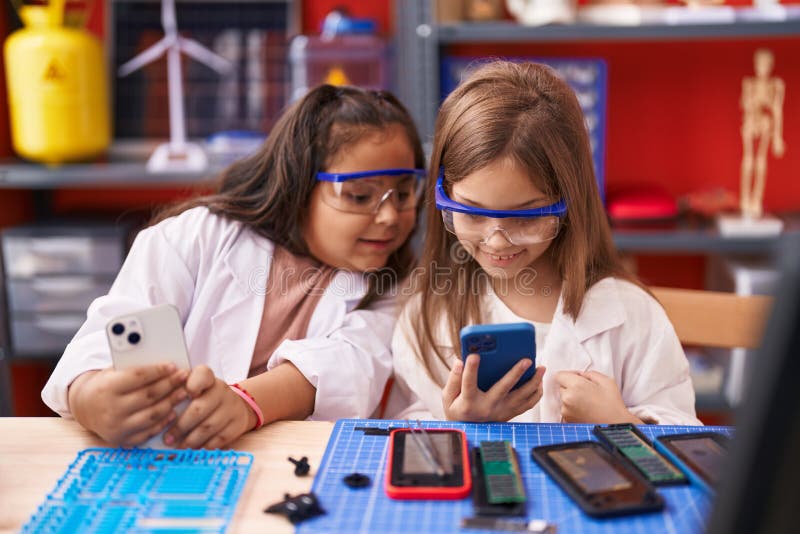 Two Kids Students Using Smartphones Standing at Laboratory Classroom ...