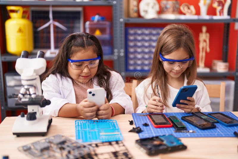 Two Kids Students Using Smartphones Standing at Laboratory Classroom ...