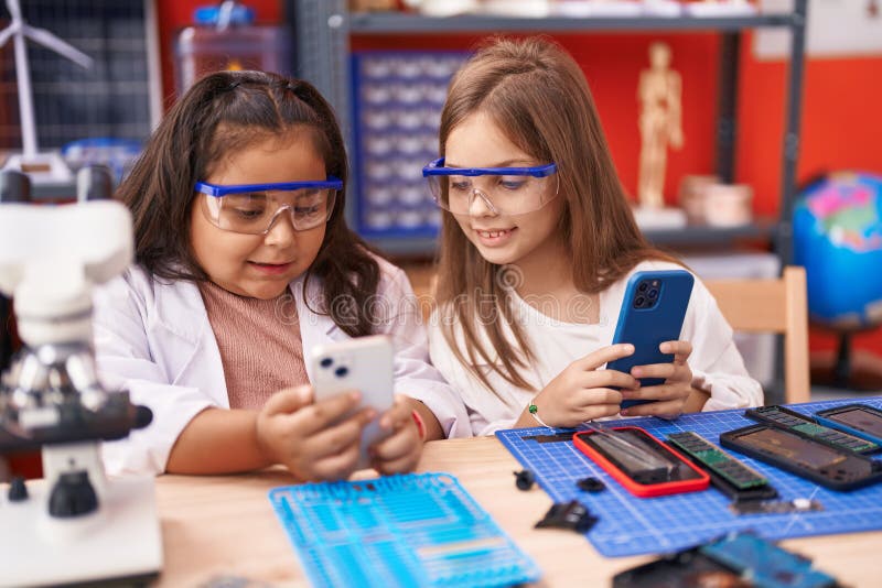 Two Kids Students Using Smartphones Standing at Laboratory Classroom ...