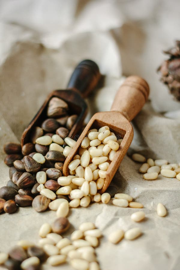 Two Kinds of Pine Nuts - with Shell and without Shell. Stock Image ...